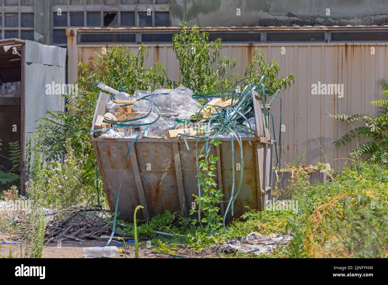 Industrial Waste in Dumpster at Abandoned Factory Complex Stock Photo ...