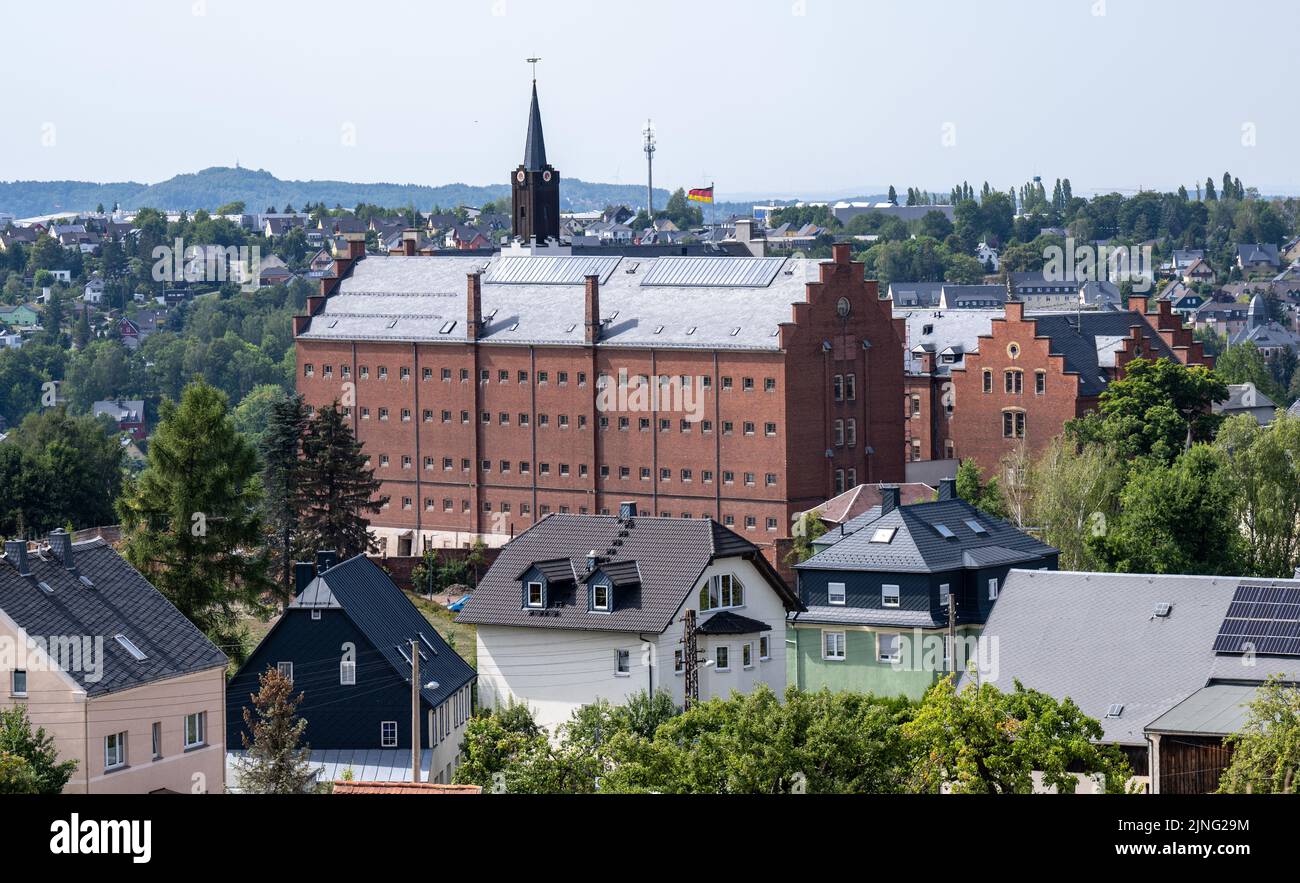 11 August 2022, Saxony, Stollberg: Hoheneck Castle towers prominently ...