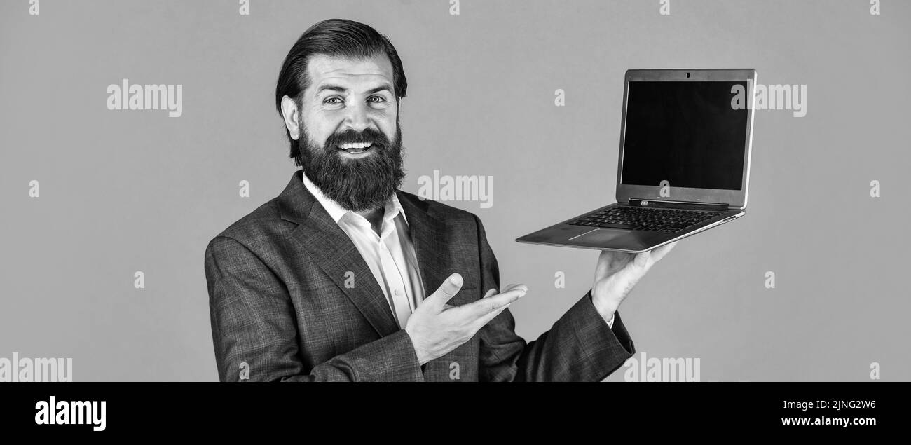 high quality notebook. go shopping online. confident businessman with ...