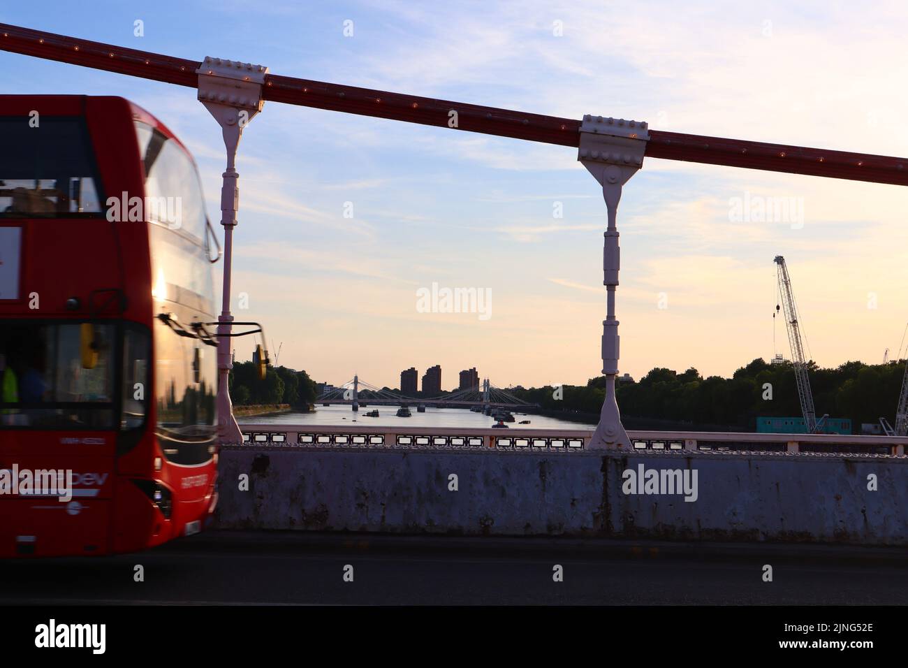 A view of the red double decker bus on the London Chelsea Bridge Stock ...