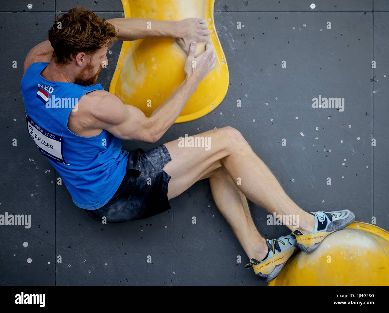 MUNICH - Tim Reuser in action during the bouldering part of the sport ...