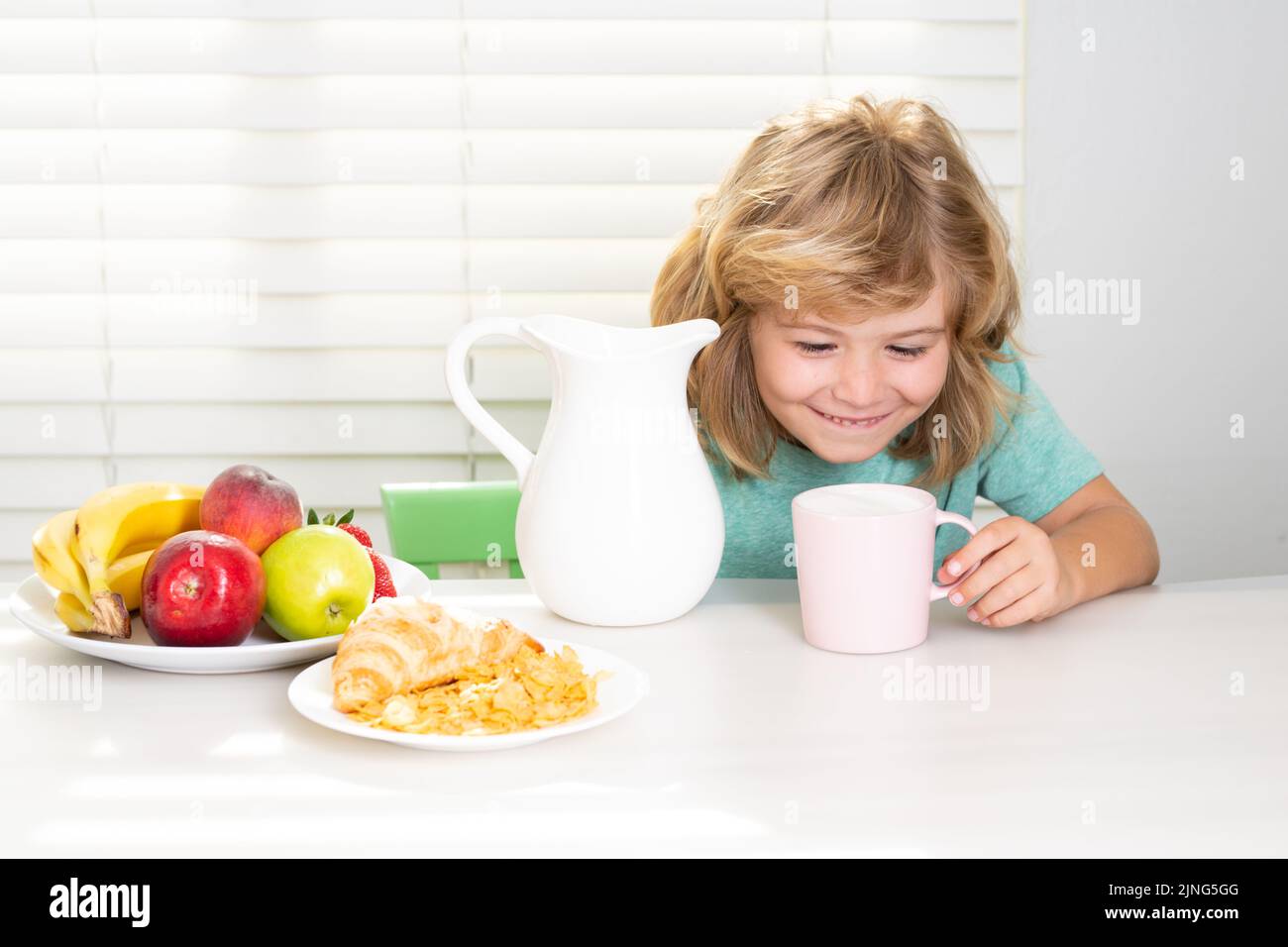 Child boy eating organic healthy food. Healthy vegetables with vitamins ...