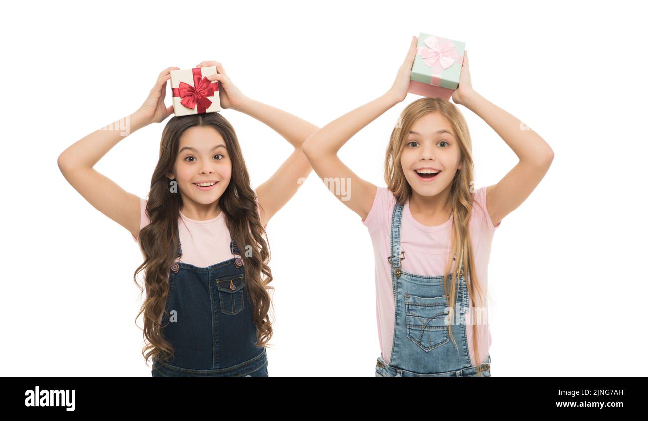 For my dear friend. Girls sisters or friends hold gift boxes. Girls ...