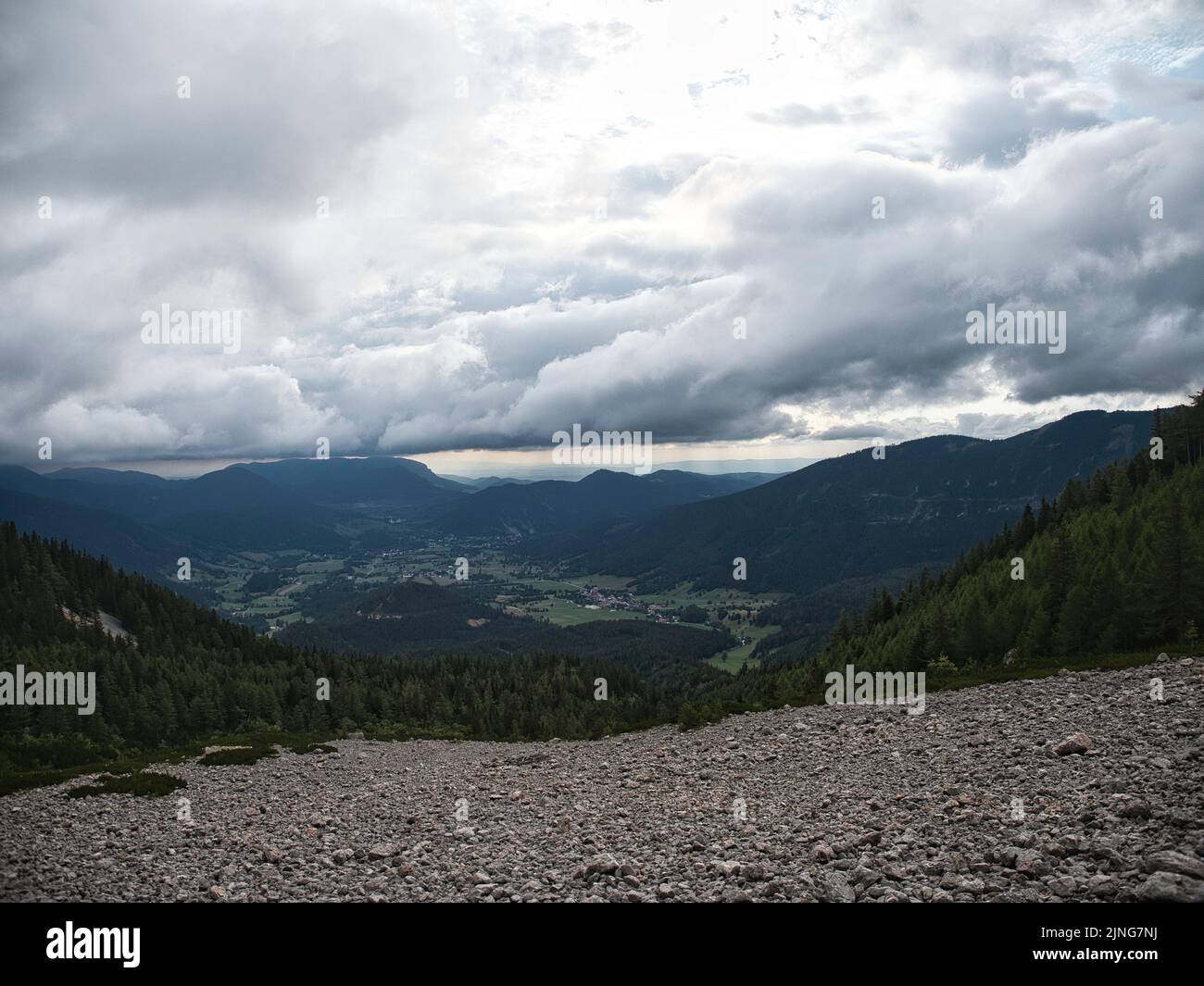 A beautiful natural view of green mountains and meadows from the top of ...