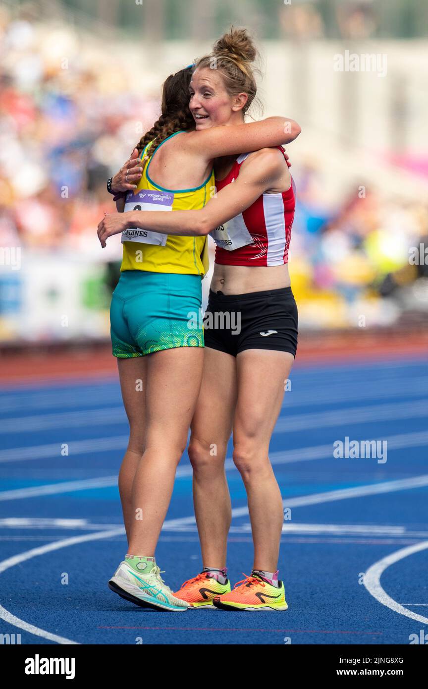 Jemima Montag of Australia and Heather Lewis off Wales hug after ...