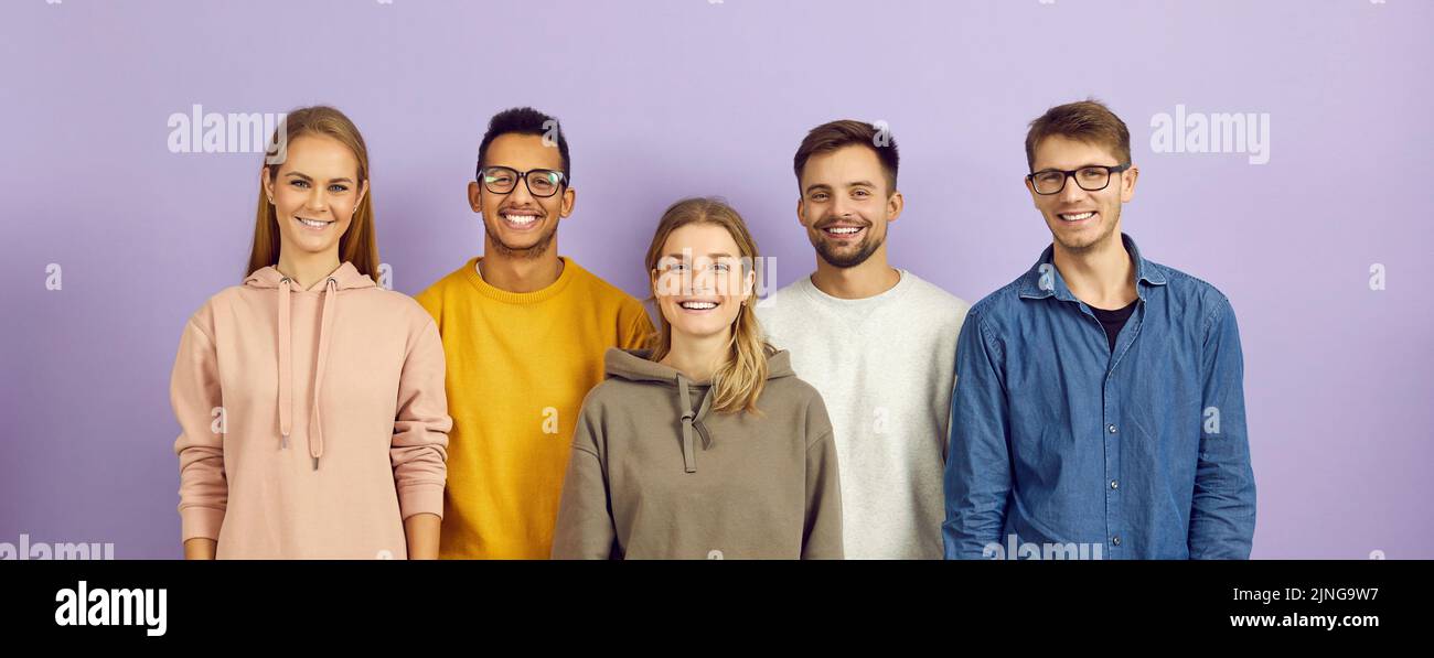 Portrait of group of young, smart and positive multiracial people on ... Portrait of group of young, smart and positive multiracial people on ...