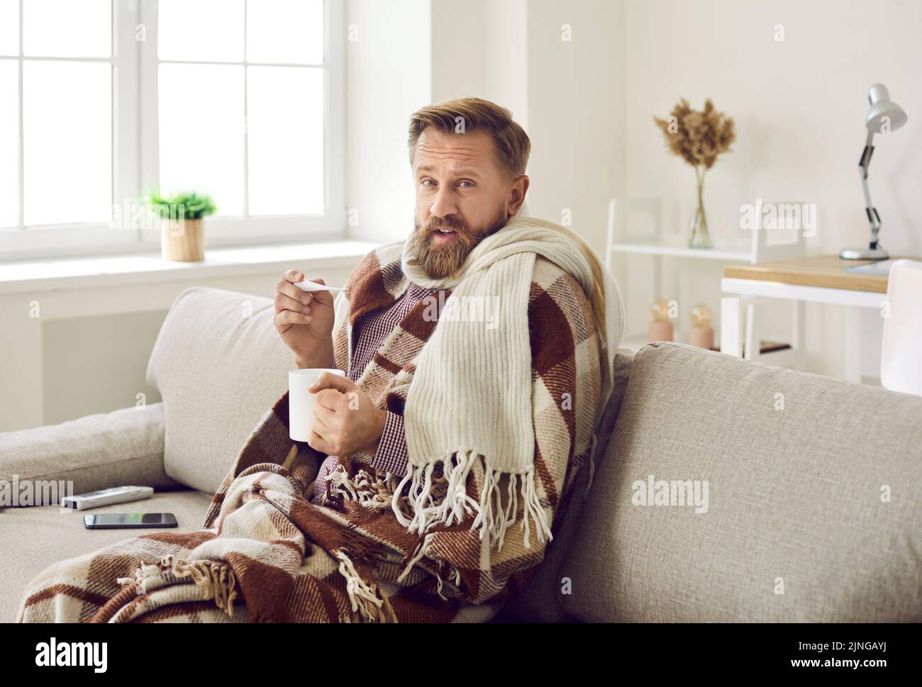 Sick man on lockdown at home with covid-19 Stock Photo - Alamy