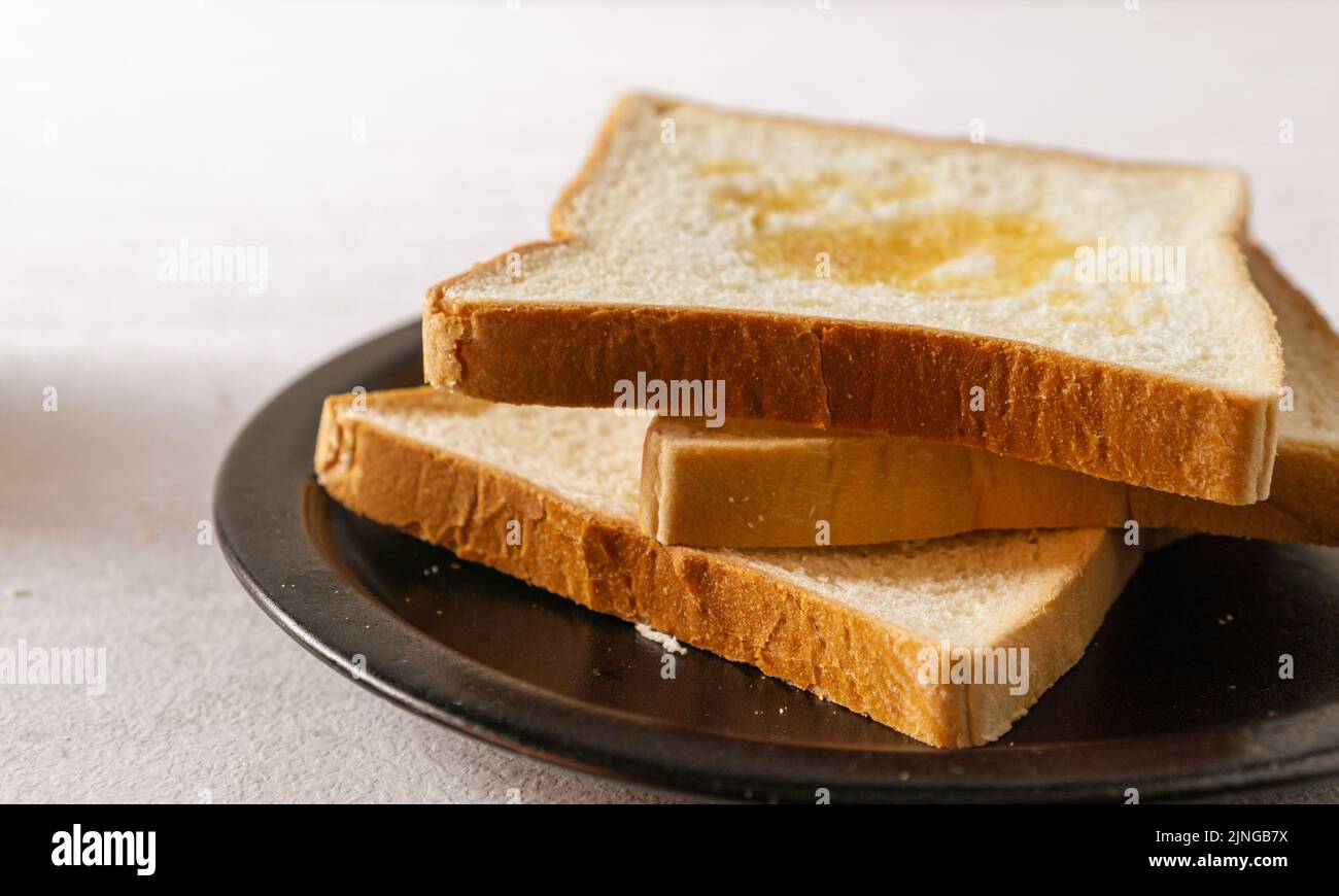 Sliced white bread on a desk. Close up. Bright mood. Horizontal ...
