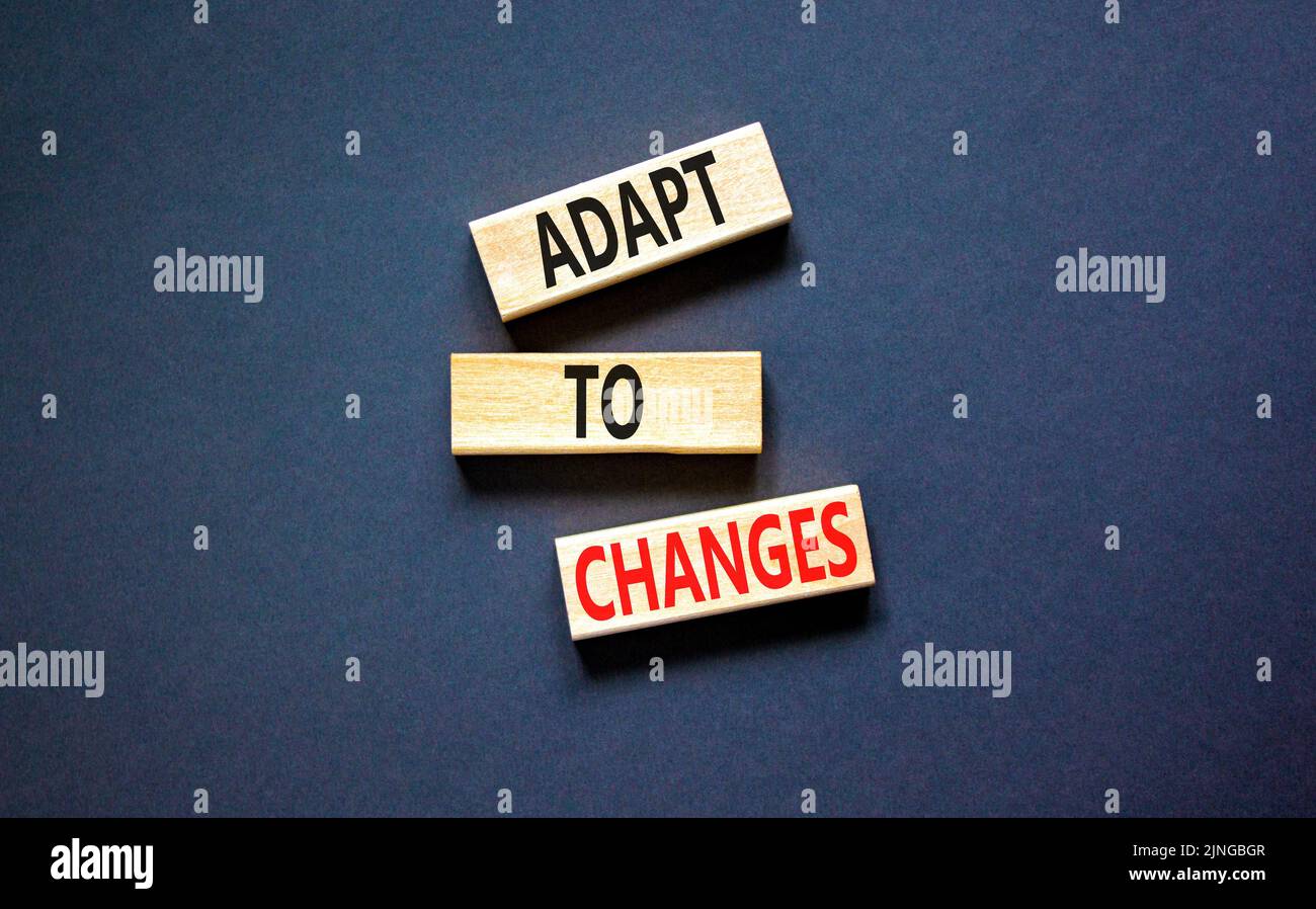 Adapt to changes symbol. Concept words Adapt to changes on wooden ...