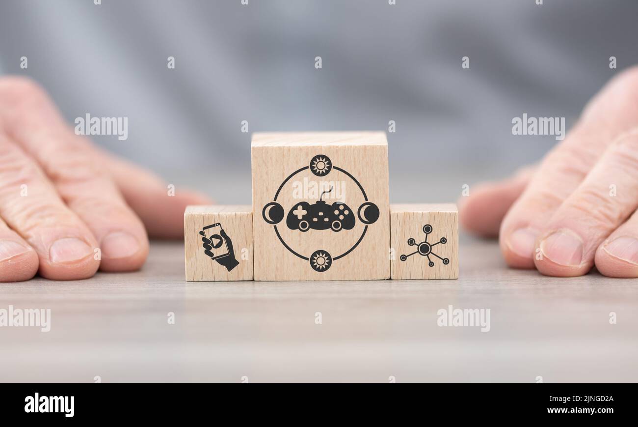 Wooden blocks with symbol of video game addiction concept Stock Photo ...