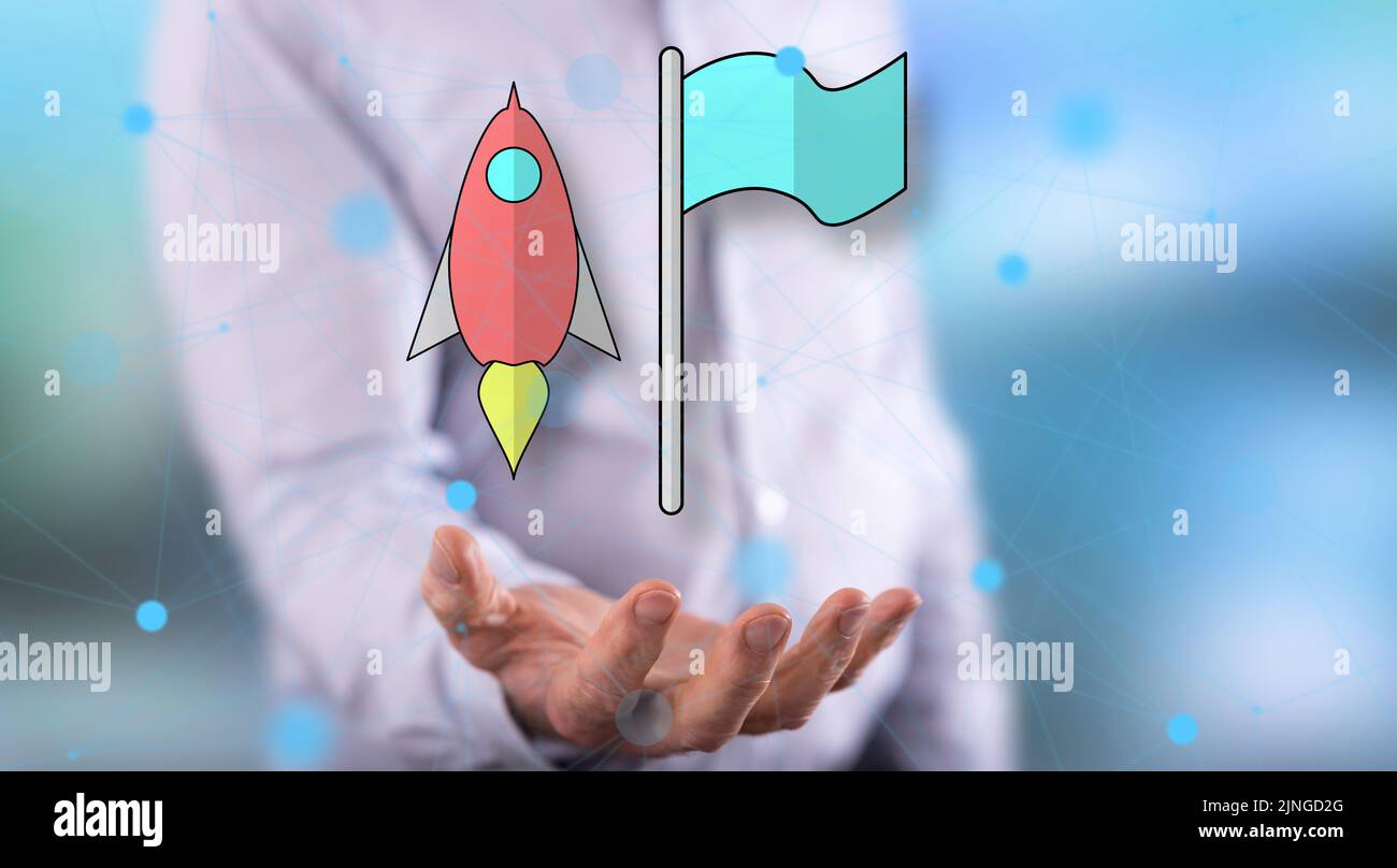 Achievement concept above the hand of a man in background Stock Photo ...