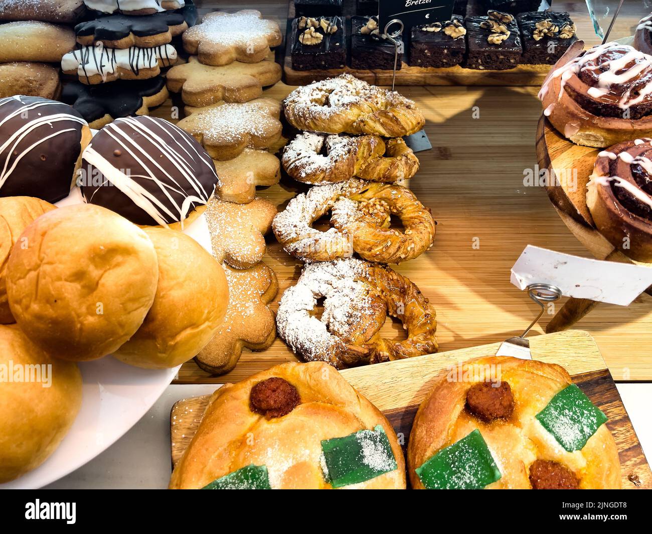 Mix of freshly baked pastries exposed in a bakary shop Stock Photo - Alamy