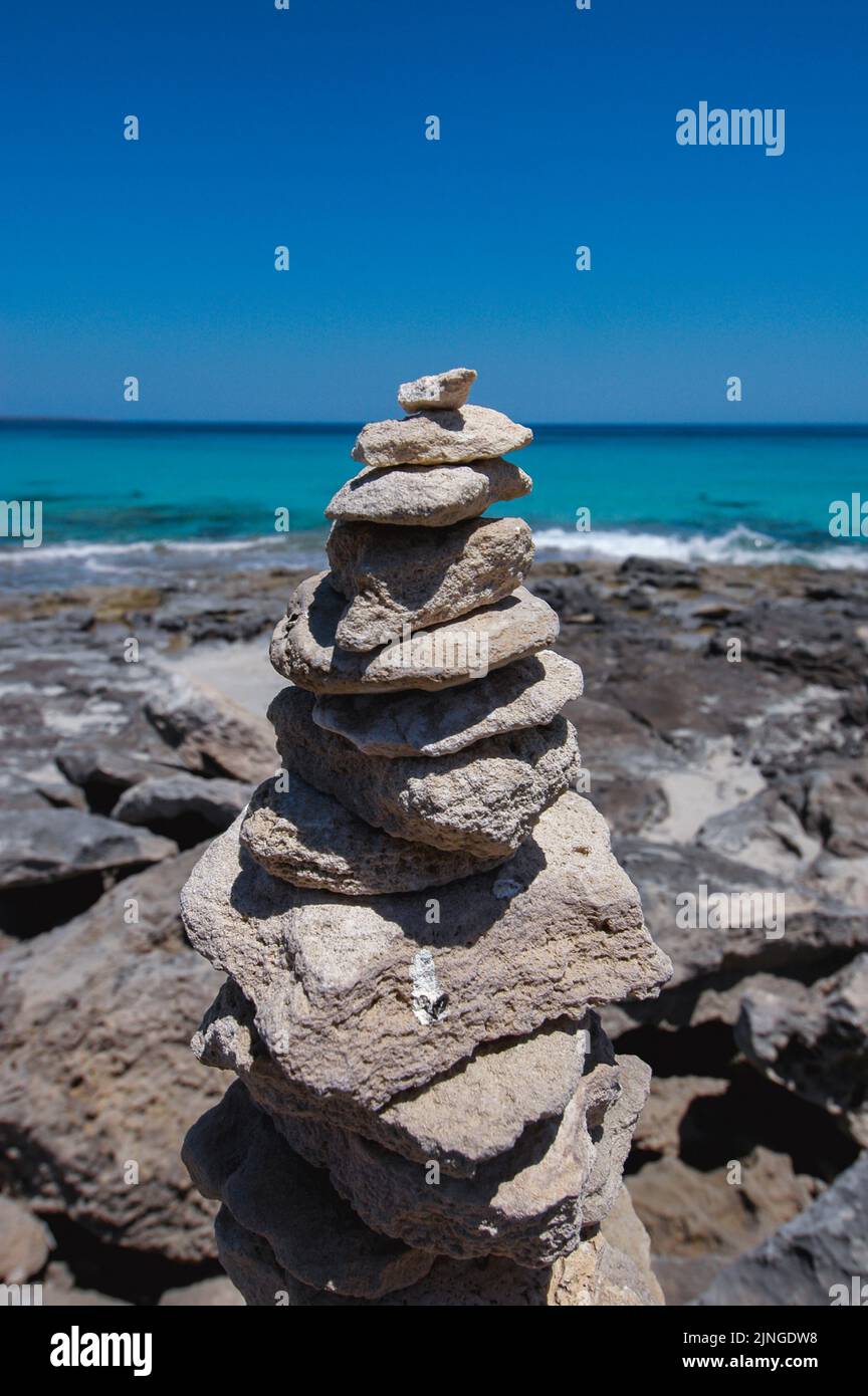 Stone sculpture at Llevant beach, in Formentera, Balearic Islands ...