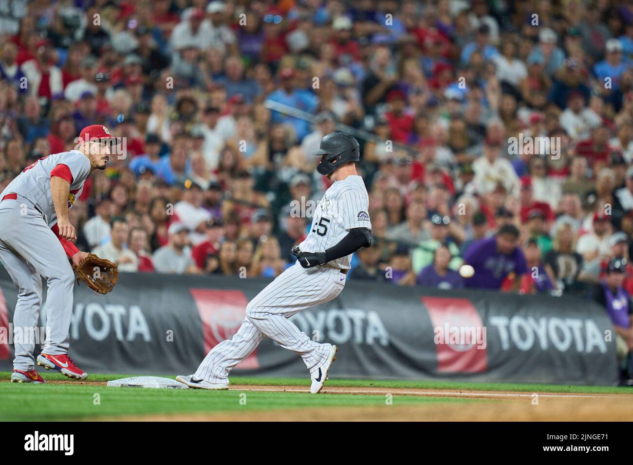 August 10 2022: Colorado first baseman C.J. Cron (25) hits a triple ...