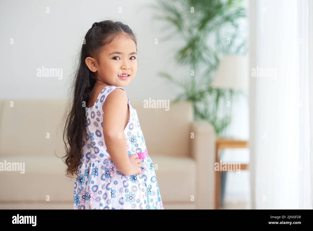 Little girl turning hi-res stock photography and images - Alamy