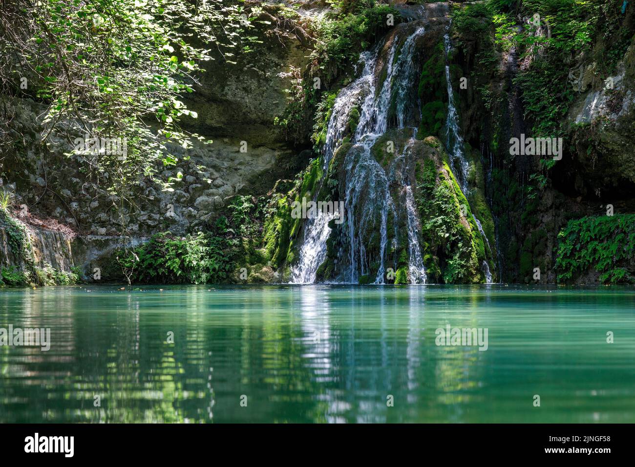Waterfall in The Valley of Butterflies. The Petaloudes valley nature ...