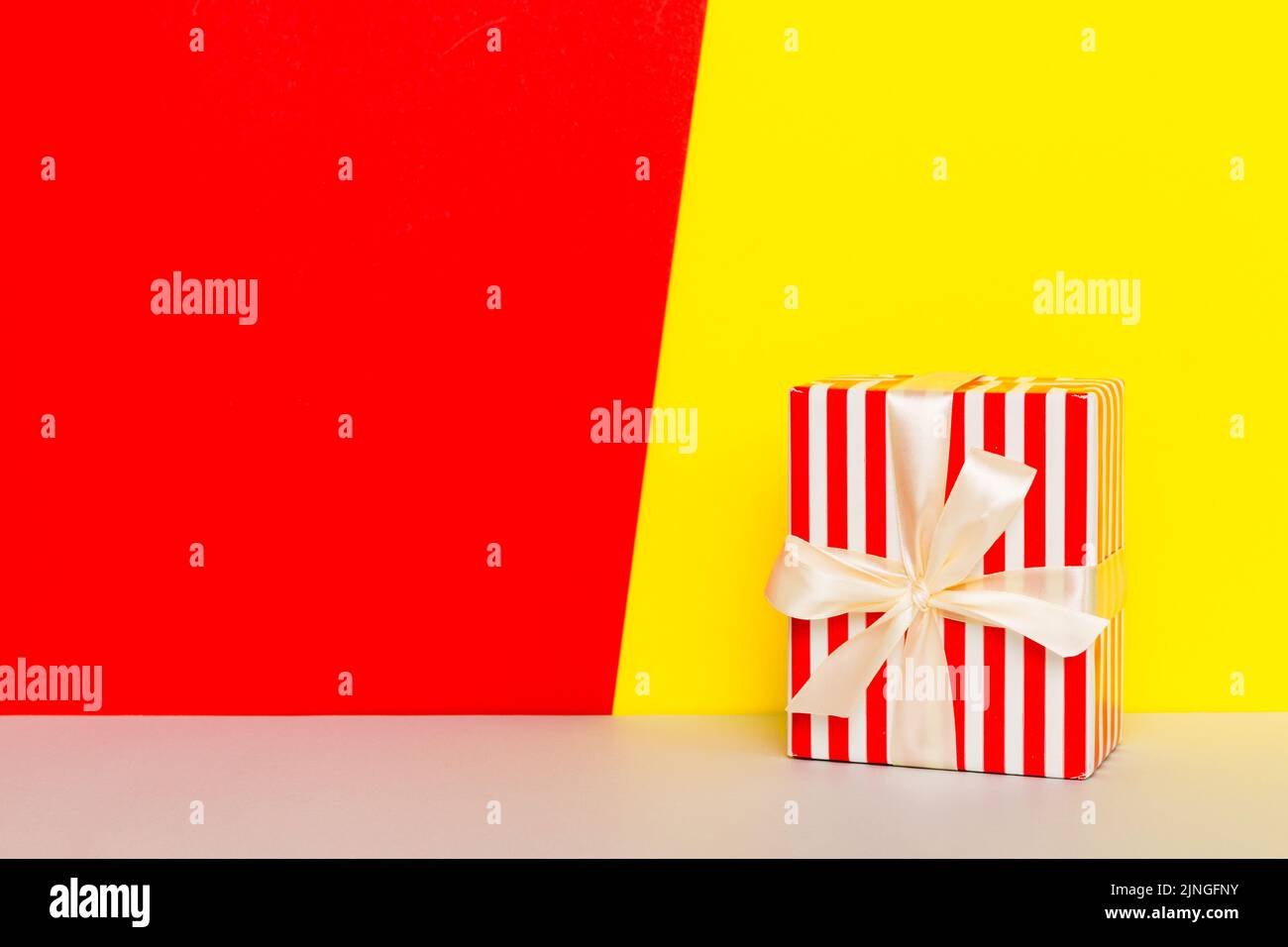 holiday paper present tied yellow ribbon bow top view with copy space ...