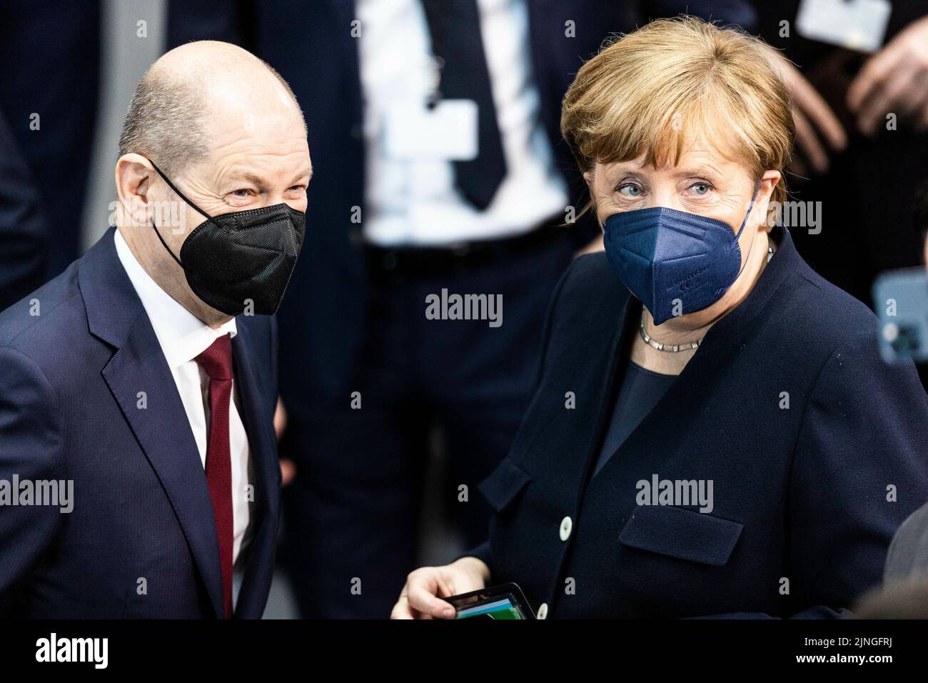 (LR) Olaf Scholz (SPD), Federal Chancellor, and Angela Merkel, former ...