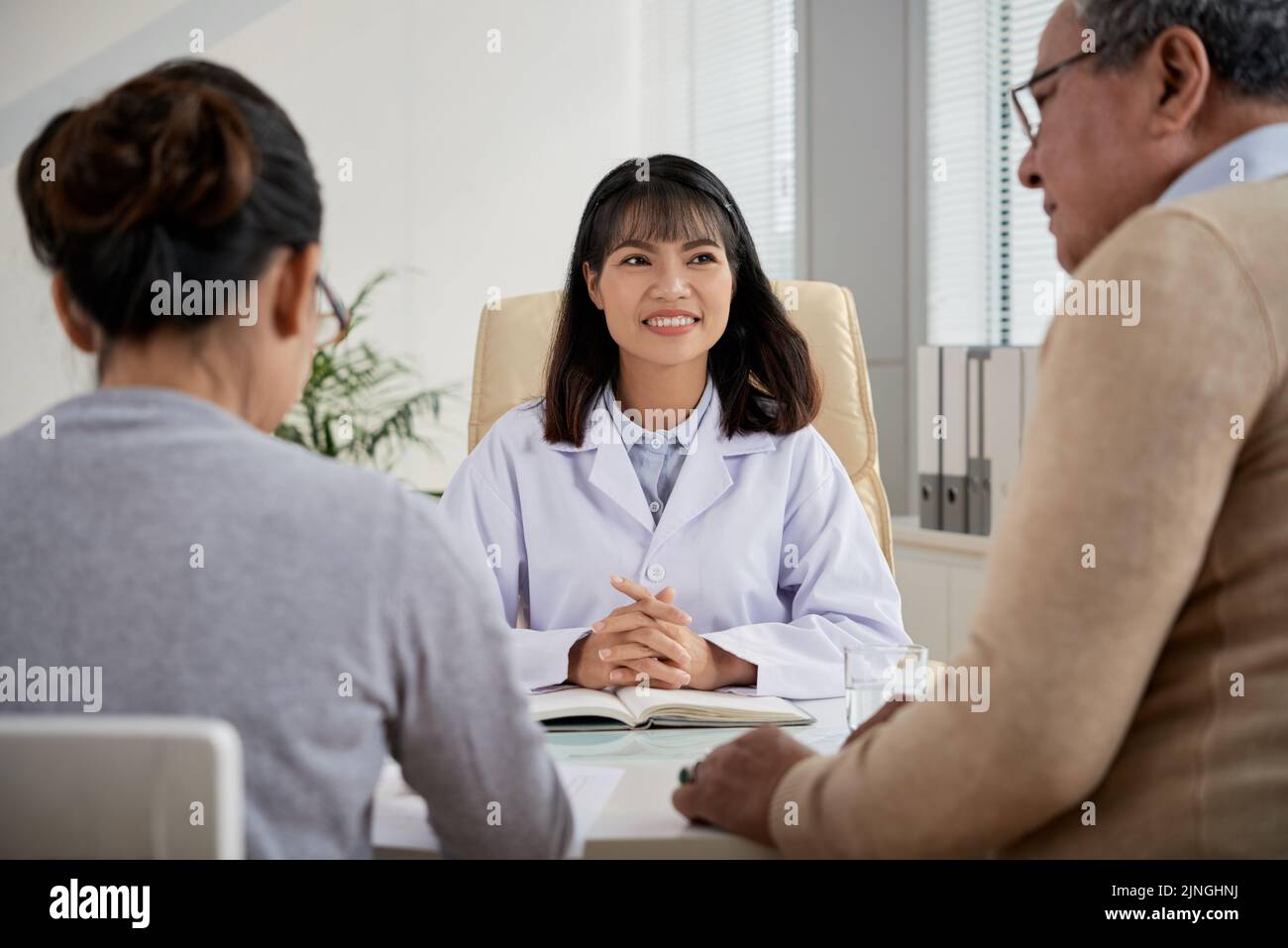 Asian doctor couple consultation hi-res stock photography and images ...