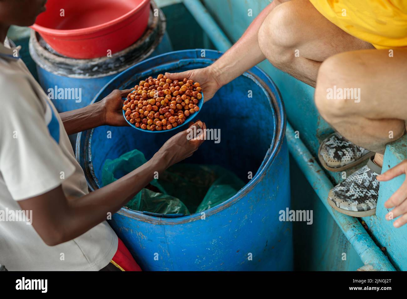 Hand passing plate hi-res stock photography and images - Alamy