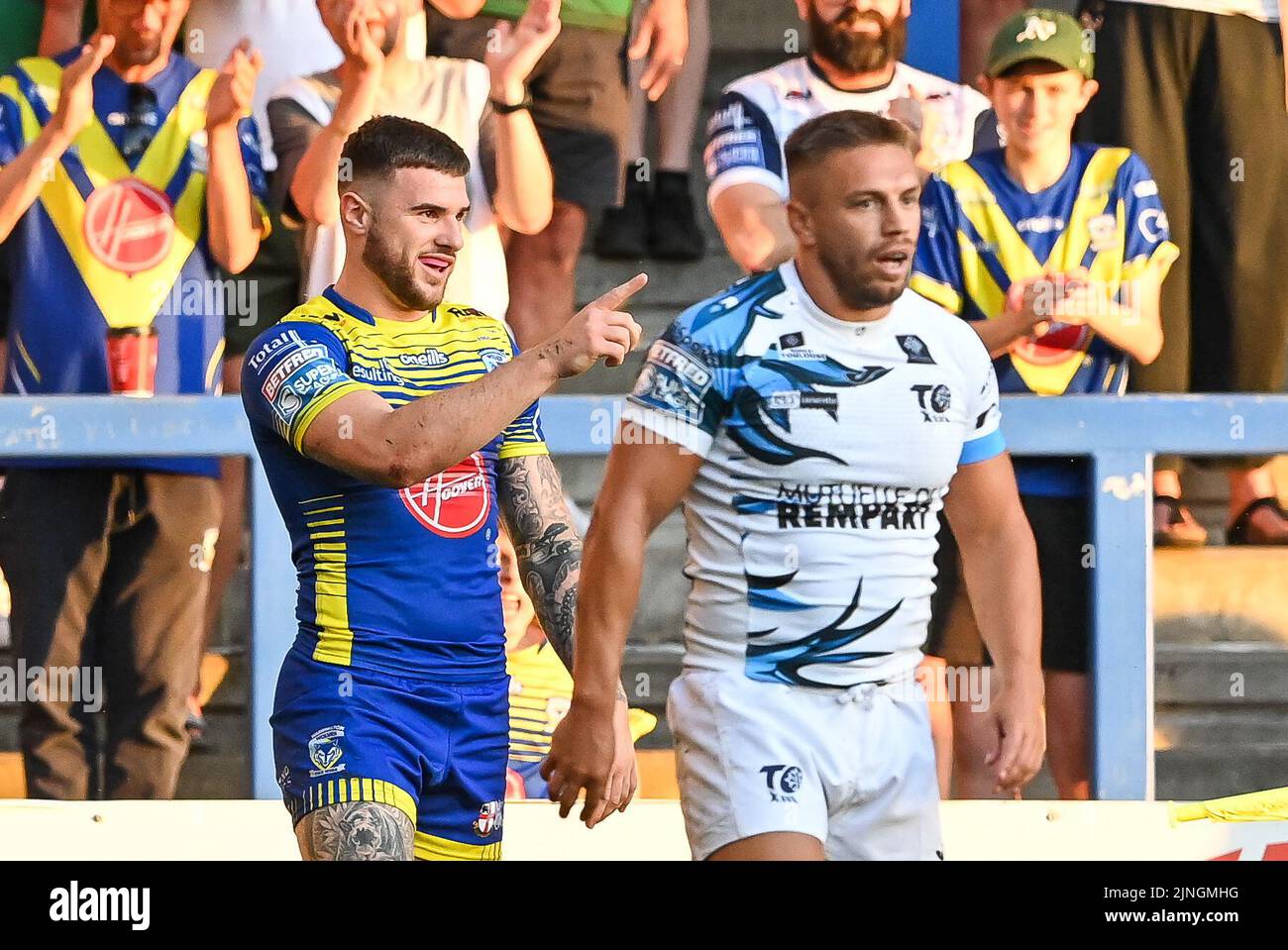 Connor Wrench #23 of Warrington Wolves celebrates his try Stock Photo ...