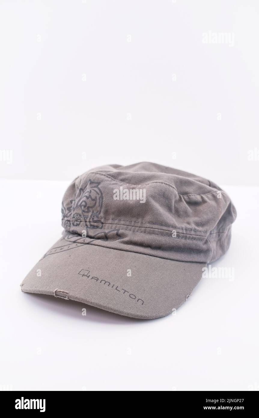 baseball cap isolated with visor on a white background with space for ...