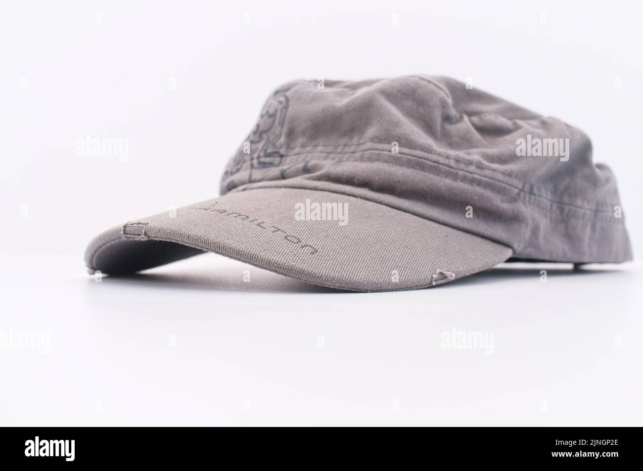 baseball cap isolated with visor on a white background with space for ...