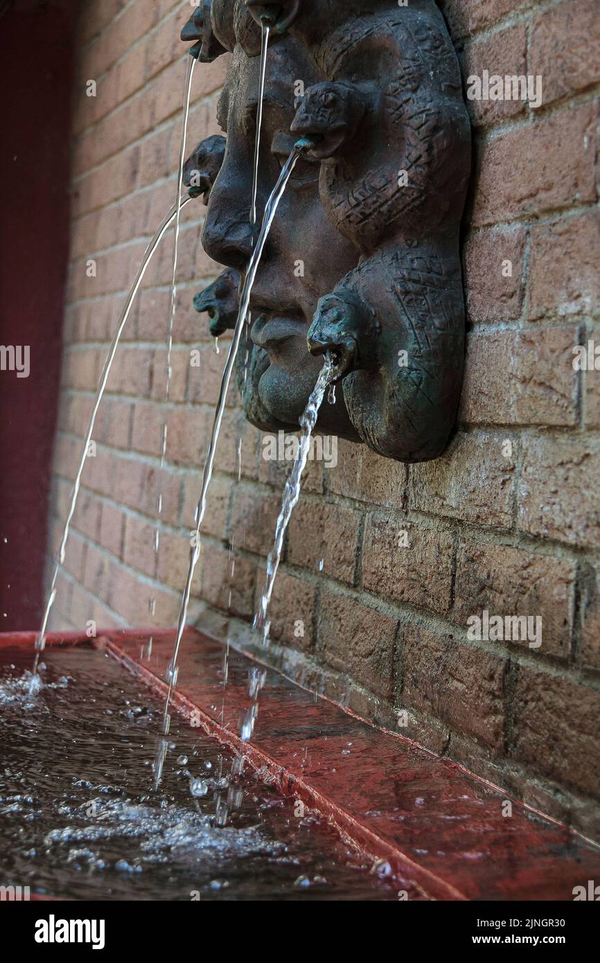 The head of Medusa Gorgon in the form of a bas-relief of the fountain ...