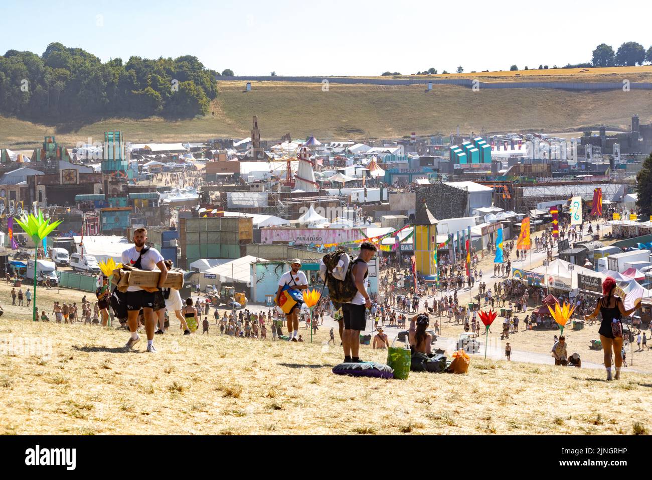 Boomtown, Winchester, UK 11 August 2022 Campers arrive in a heatwave at ...