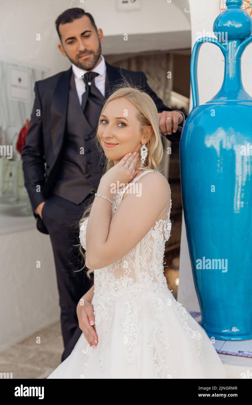 Newlywed couple standing near hi-res stock photography and images - Alamy