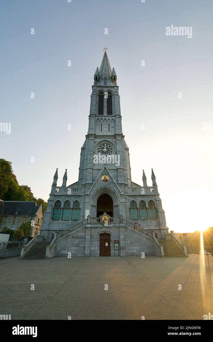 Sunset at Sanctuaires Notre-Dame de Lourdes, a Catholic pilgrimage site ...