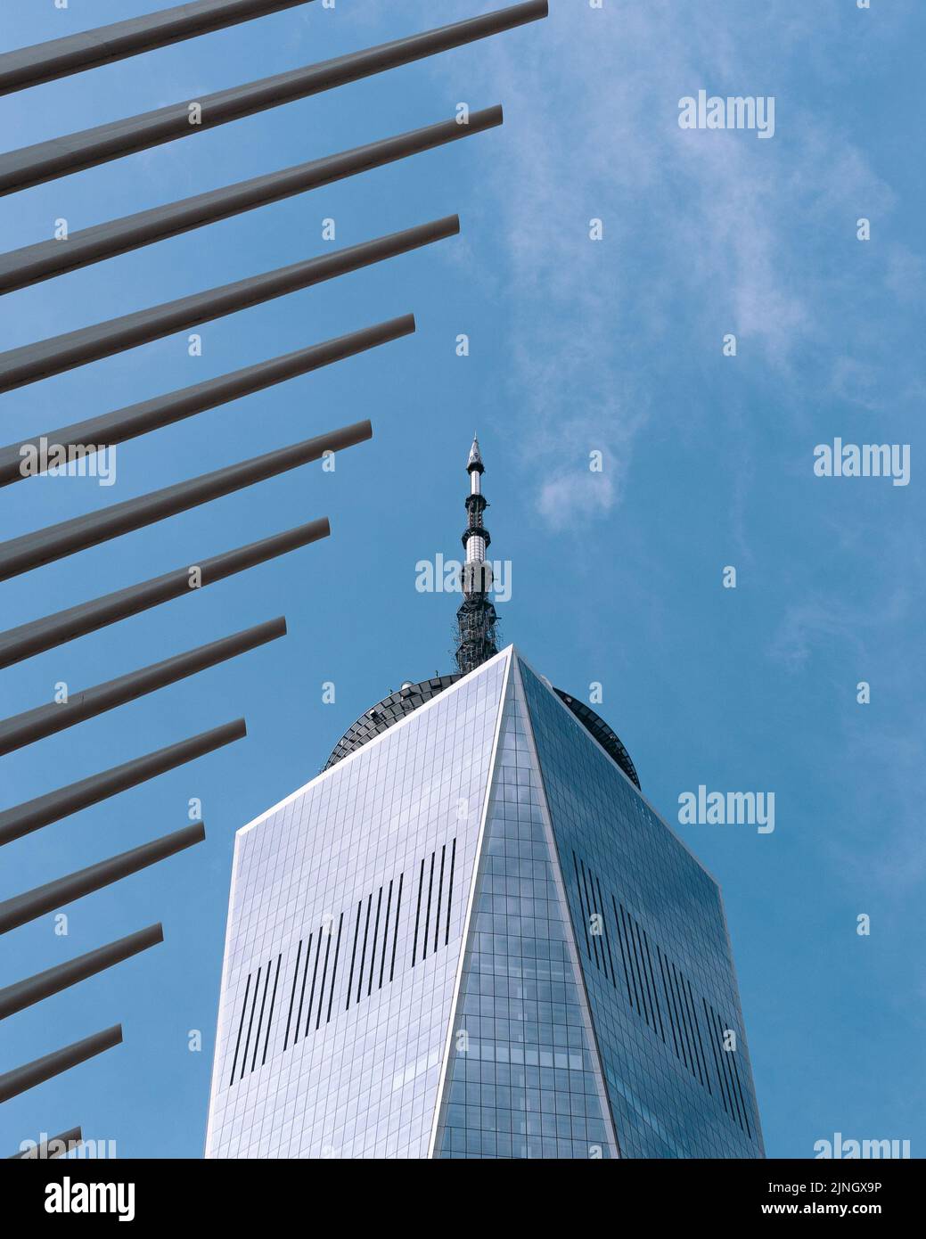 A low angle shot of One World Trade Center with the Oculus structure in ...