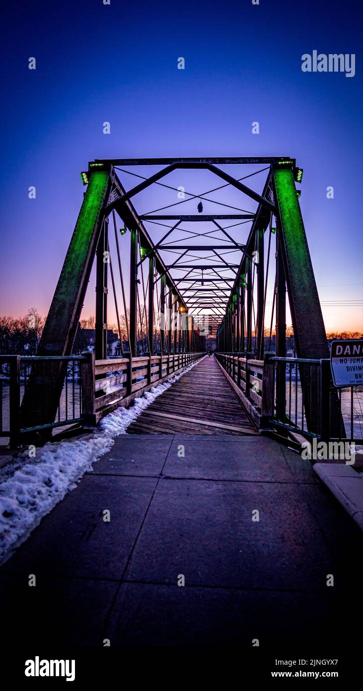 A vertical shot of a Eau Claire Wisconsin bridge at night Stock Photo ...