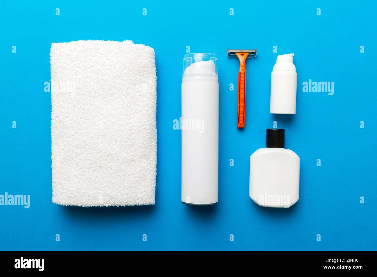 shaving man set. shaving machine, towel, lotion and shaving foam on ...
