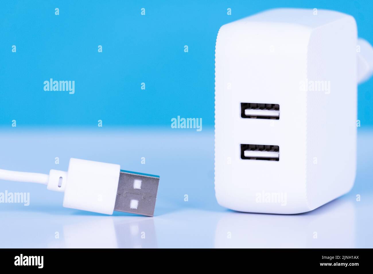 one cable and one dual USB desktop connection Stock Photo - Alamy