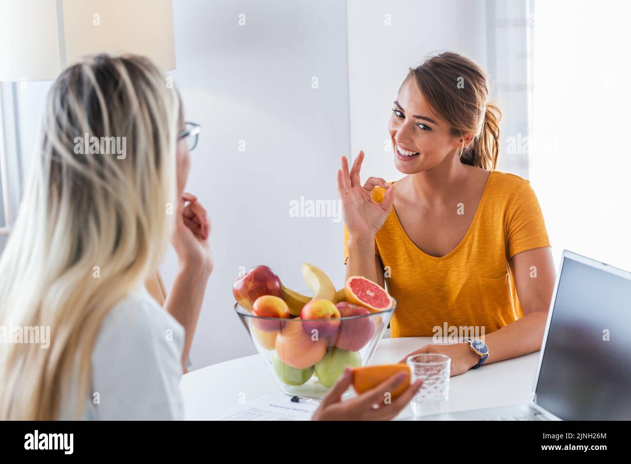 Professional nutritionist meeting a patient in the office. young ...