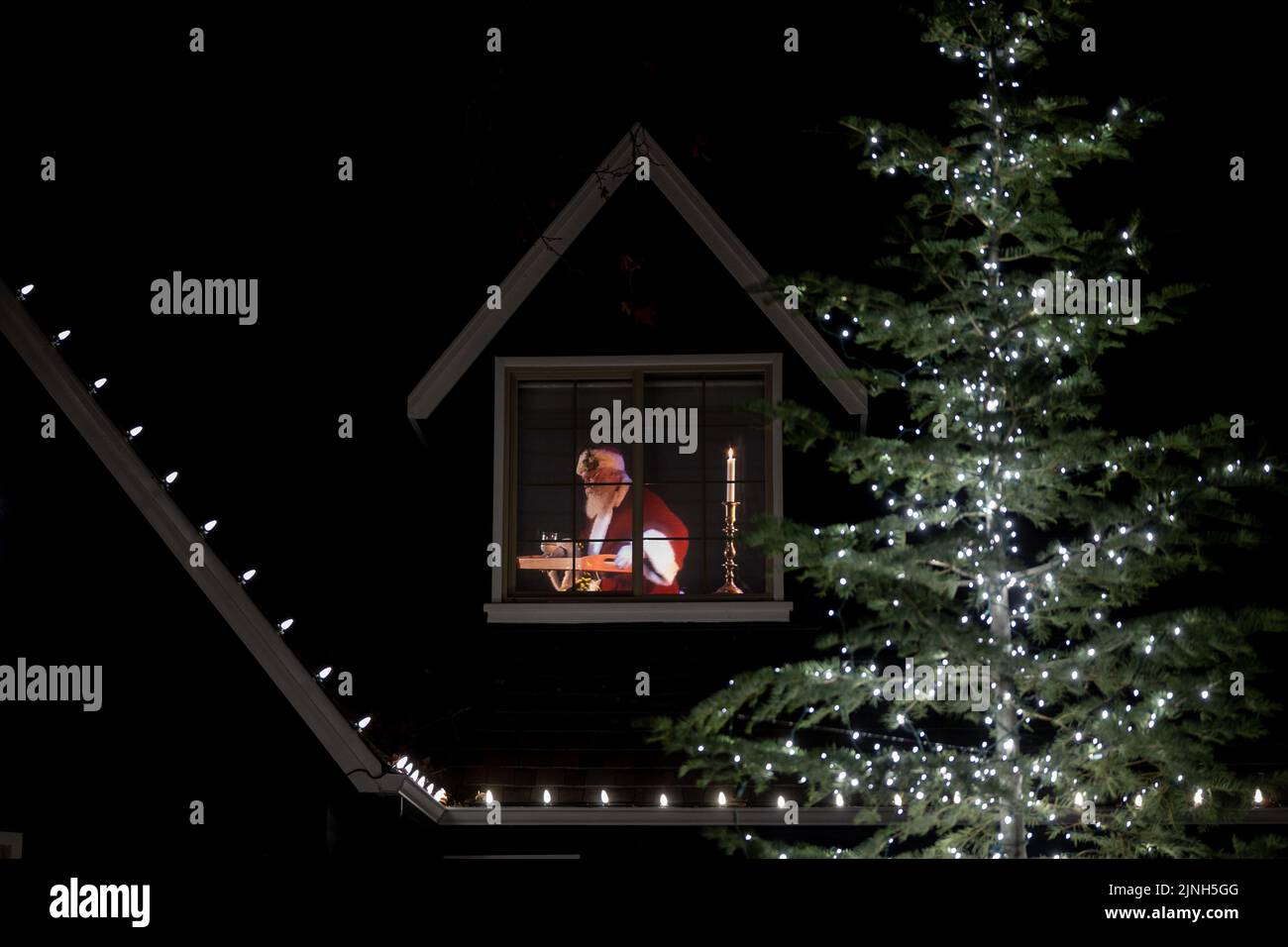 Santa through the window inside a house on black background- holiday ...