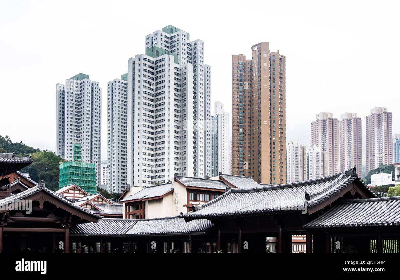 The traditional Chinese roofs against a background of modern ...