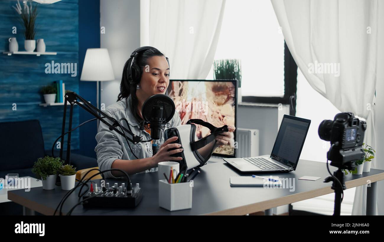 Young famous influencer filming review hi-res stock photography and ...