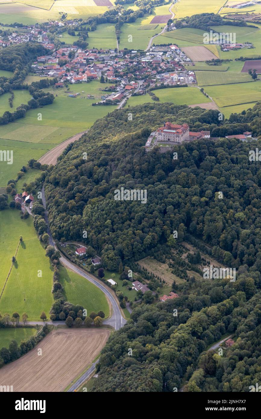 An aerial view of Bieberstein Castle with forest in Rhine, Germany ...