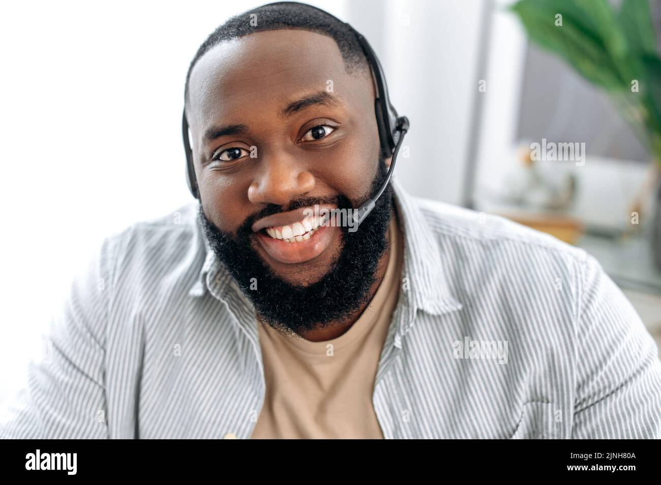 African american man headset holds hi-res stock photography and images ...