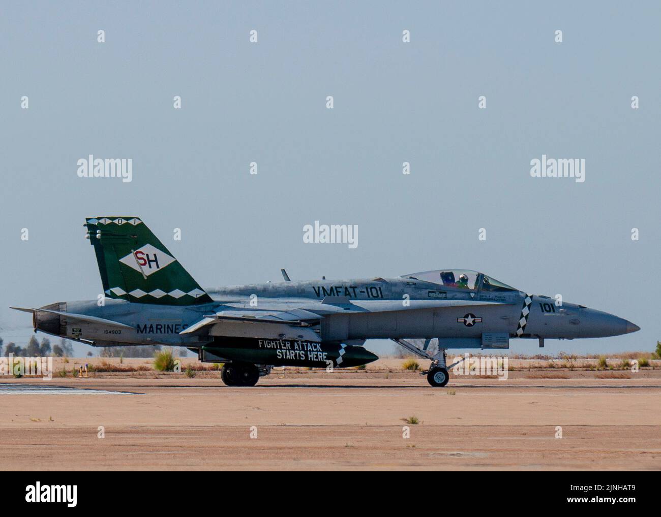 A U.S. Marine Corp F-18 Hornet takes off for aerial maneuvers at ...