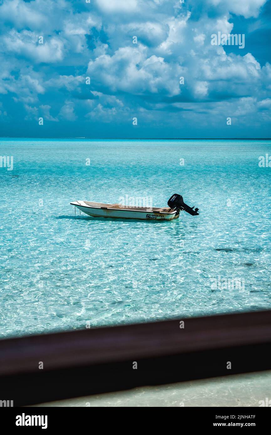 Vertical shot floating boat hi-res stock photography and images - Alamy