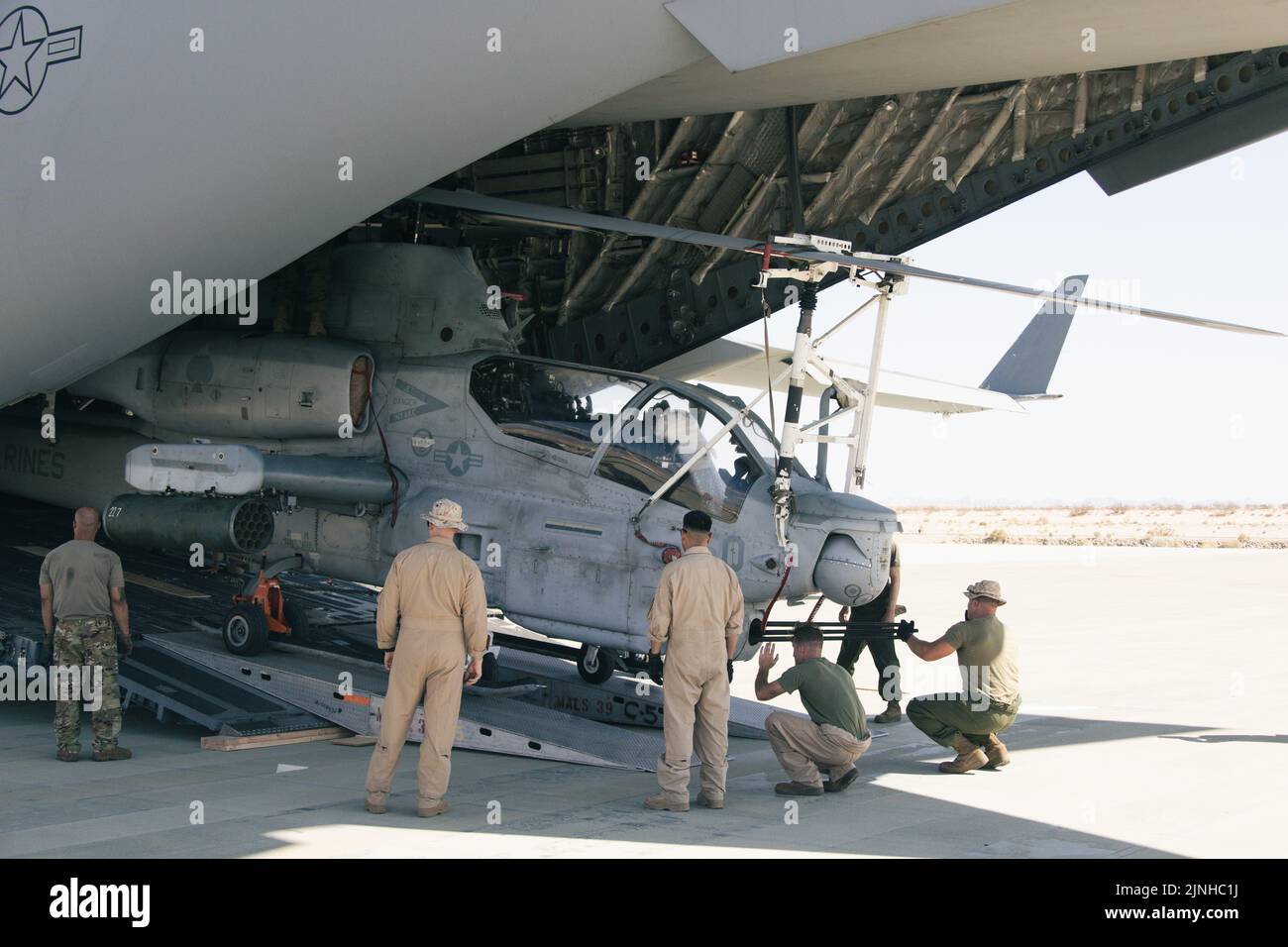 U.S. Marines with Marine Light Attack Helicopter Squadron (HMLA) 267 ...