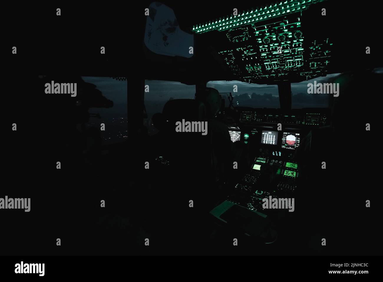 U.S. Air Force pilots assigned to the 14th Airlift Squadron conduct a ...