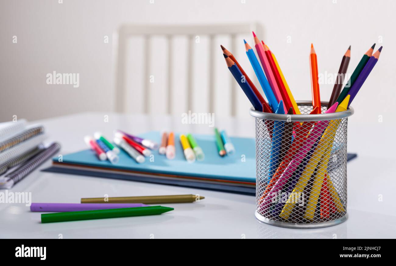 School stationery on desk Stock Photo - Alamy
