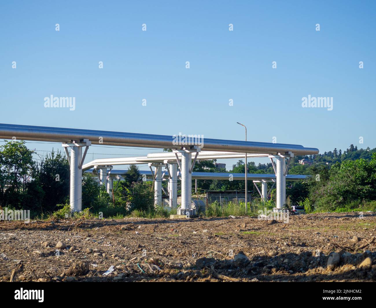Large pipe above the ground. Gas communications. Pipes in the city ...