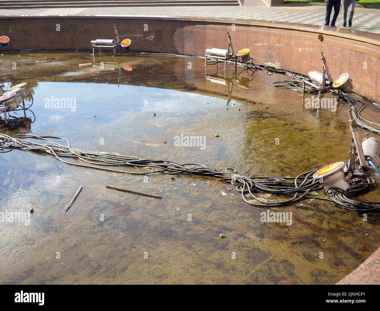 Equipment for dancing fountains. Drained fountain in the park. Without ...
