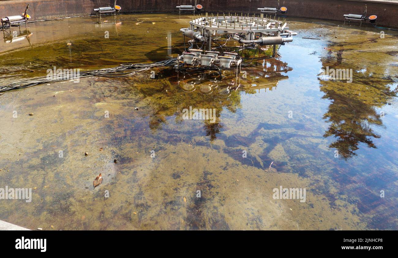 Equipment for dancing fountains. Drained fountain in the park. Without ...