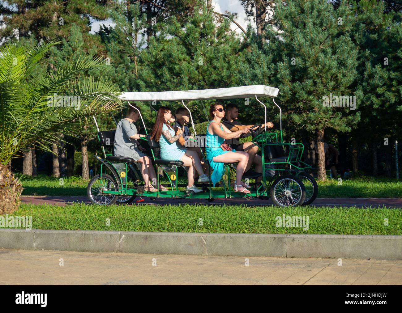 Batumi, Georgia. 07.29.2022 Pedal car for the family. Bicycle for six ...